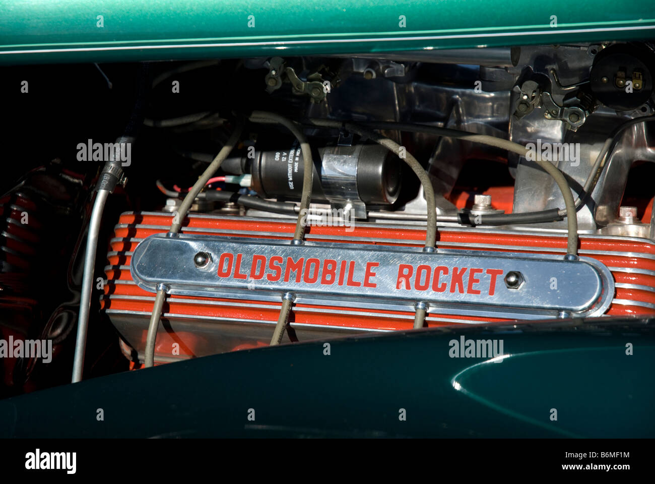 A valve cover on an "Oldsmobile Rocket" engine at a car show Stock ...