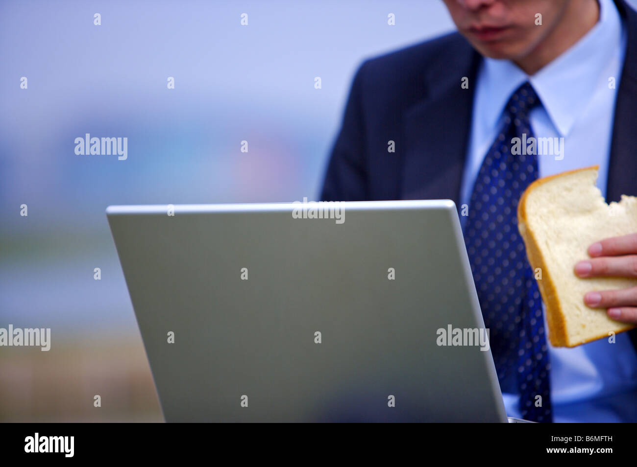Businessman Eating Toast High Resolution Stock Photography and Images ...