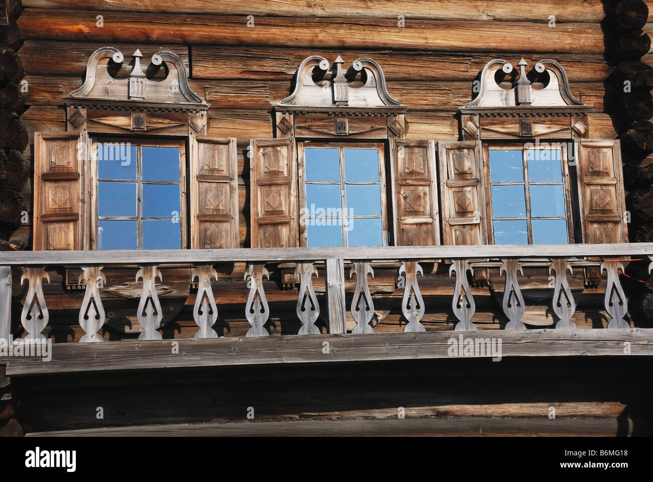 traditional beautifully decorated window of a wooden house Stock Photo ...