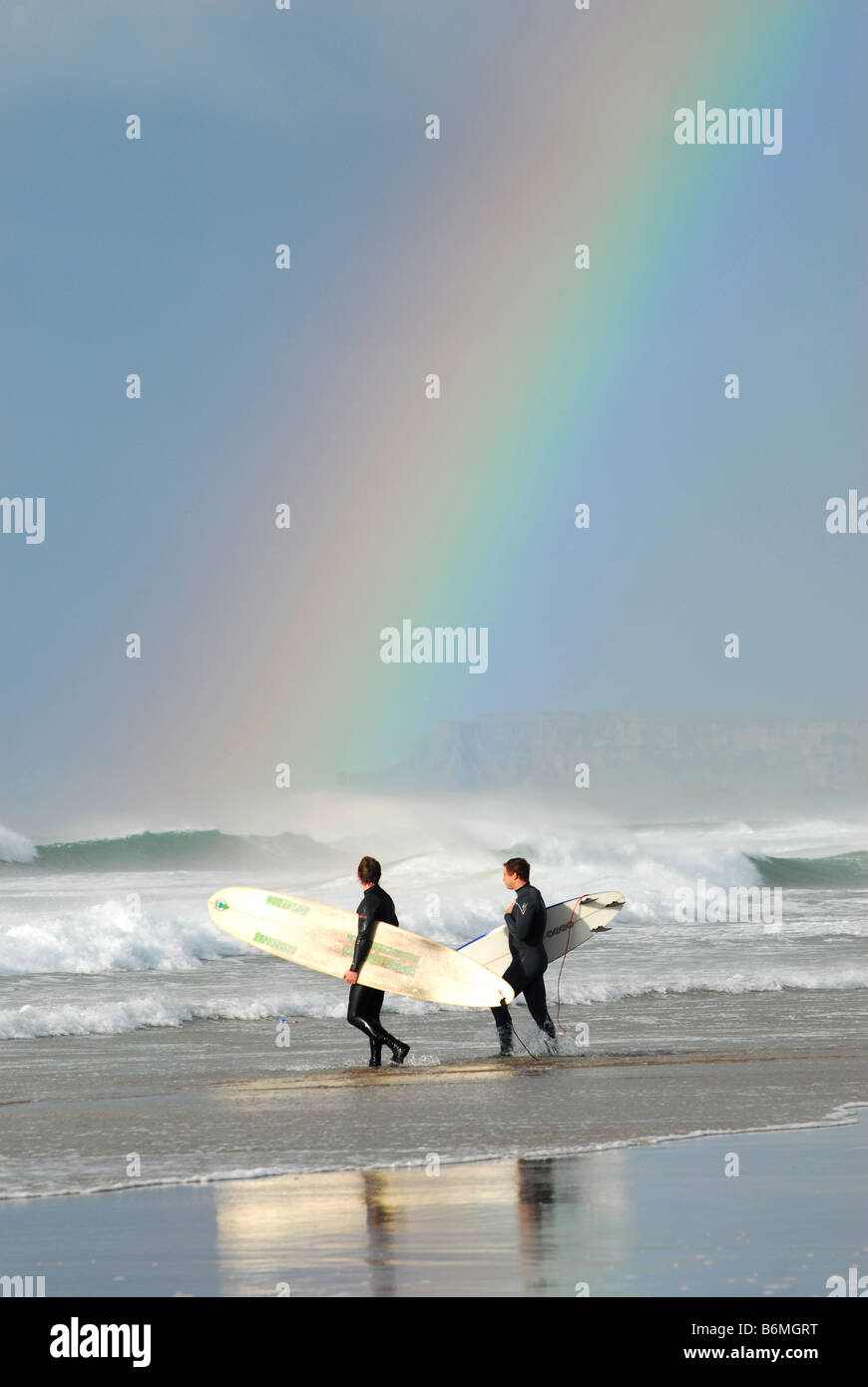 Surfers on the East Strand Portrush County Antrim Northern Ireland ...