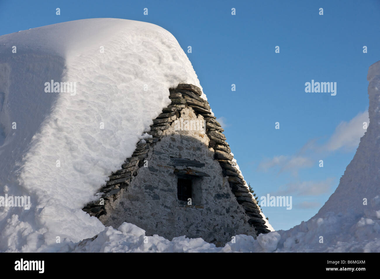 A stone-house covered with snow Stock Photo - Alamy