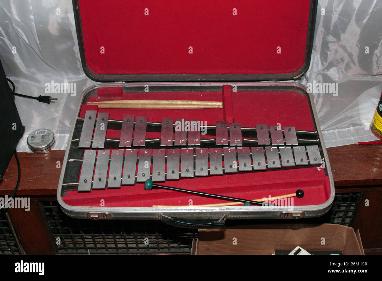 Dusty steel xylophone bells inside red felt-lined case, with sticks and ...