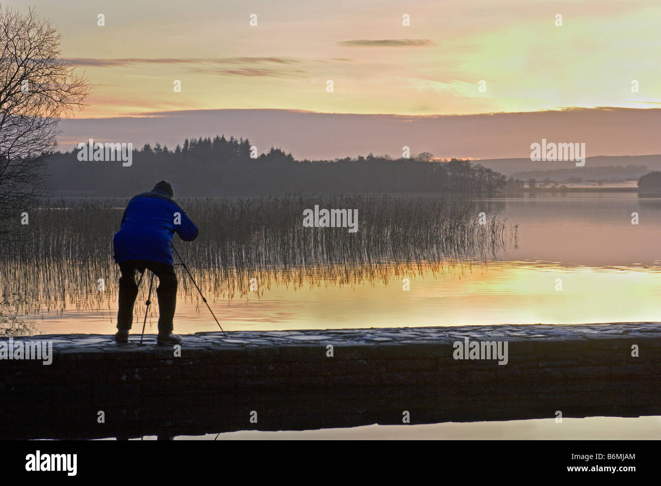 Photographer reflections Lake Menteith Loch Lomond Trossachs National ...