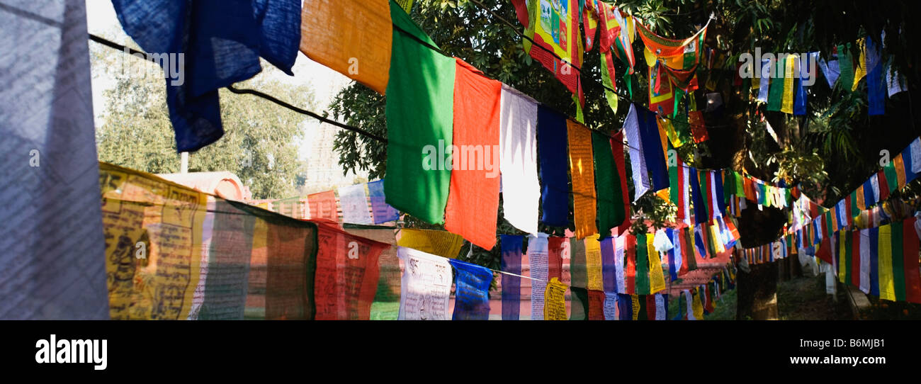 Multi-colored prayer flags at a temple, Mahabodhi Temple, Bodhgaya ...