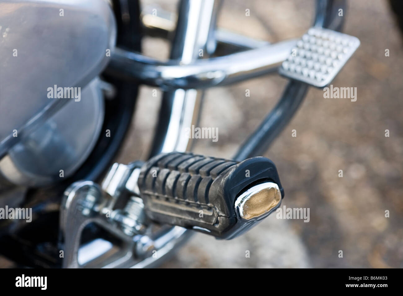 Close up of footrest motorcycle and brake Stock Photo - Alamy