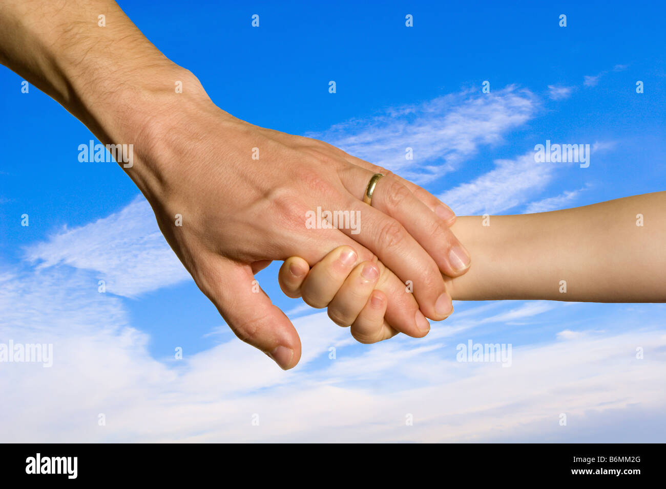 hand of father and child on the sky Stock Photo - Alamy