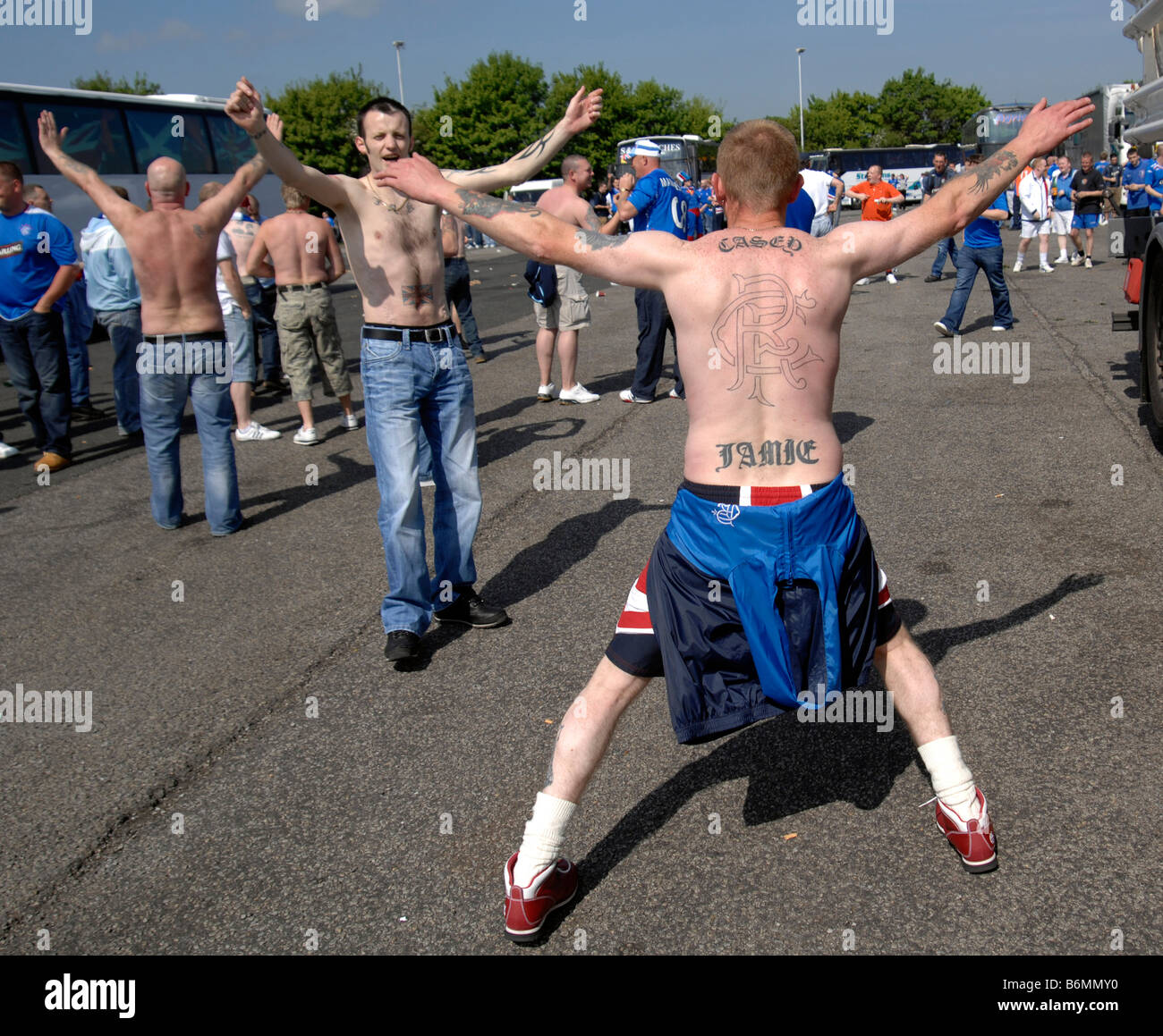 Glasgow Rangers fans gather at a motorway service area before the UEFA ...