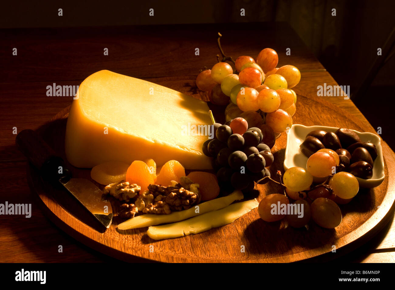 Cheese and fruit platter Stock Photo - Alamy