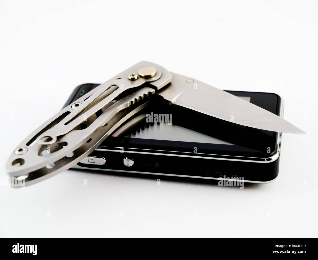 Mobile Cell Phone and Cutting Edge of Knife on White Stock Photo - Alamy