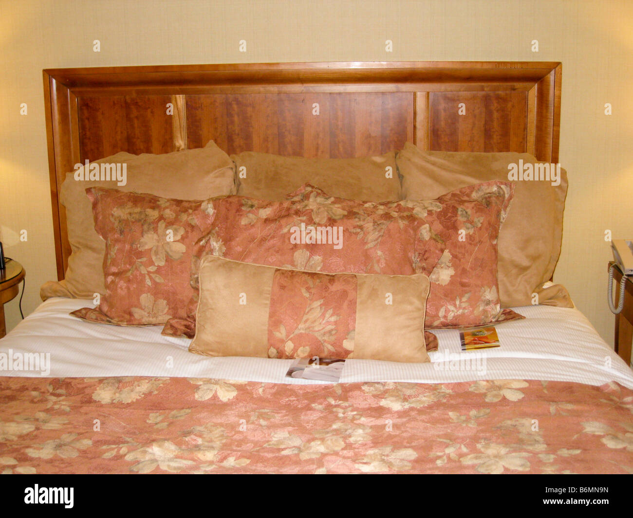 Luxury hotel room in USA with king size bed and multiple pillows Stock ...