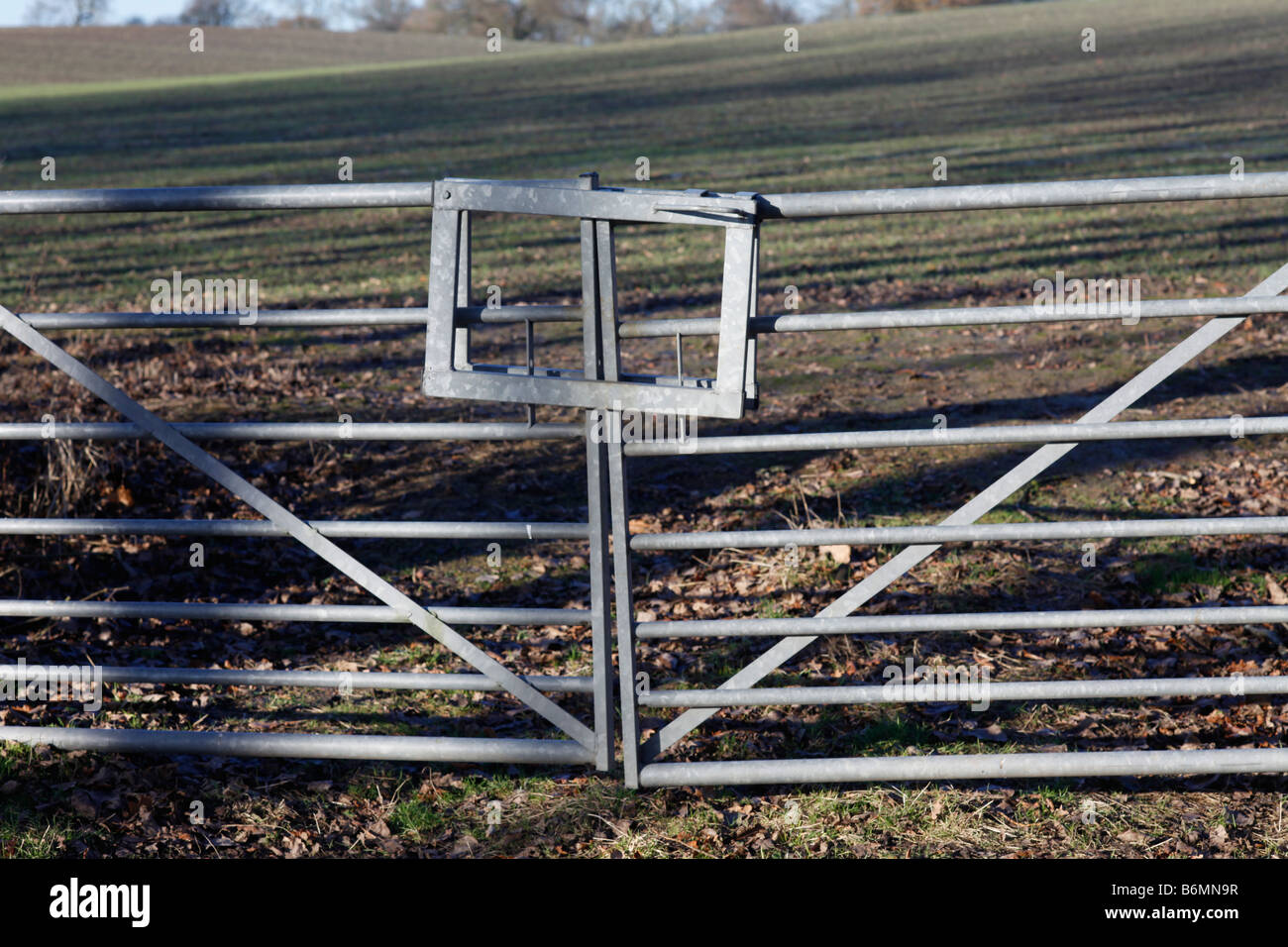 metal gate entrance to field Stock Photo - Alamy