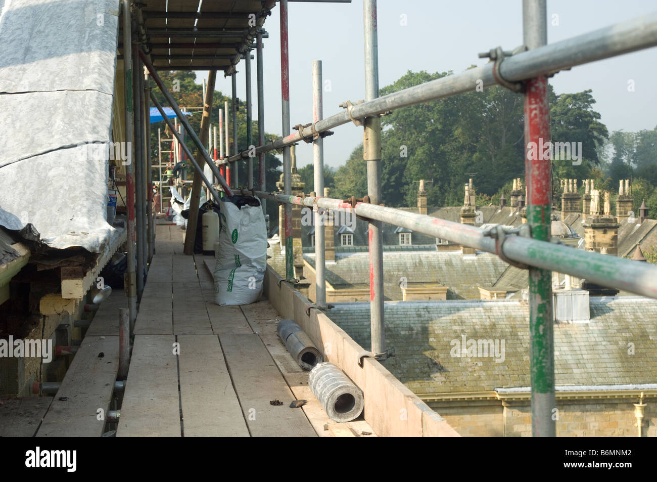 Scaffolding erected to work with lead on traditional roof in safety ...