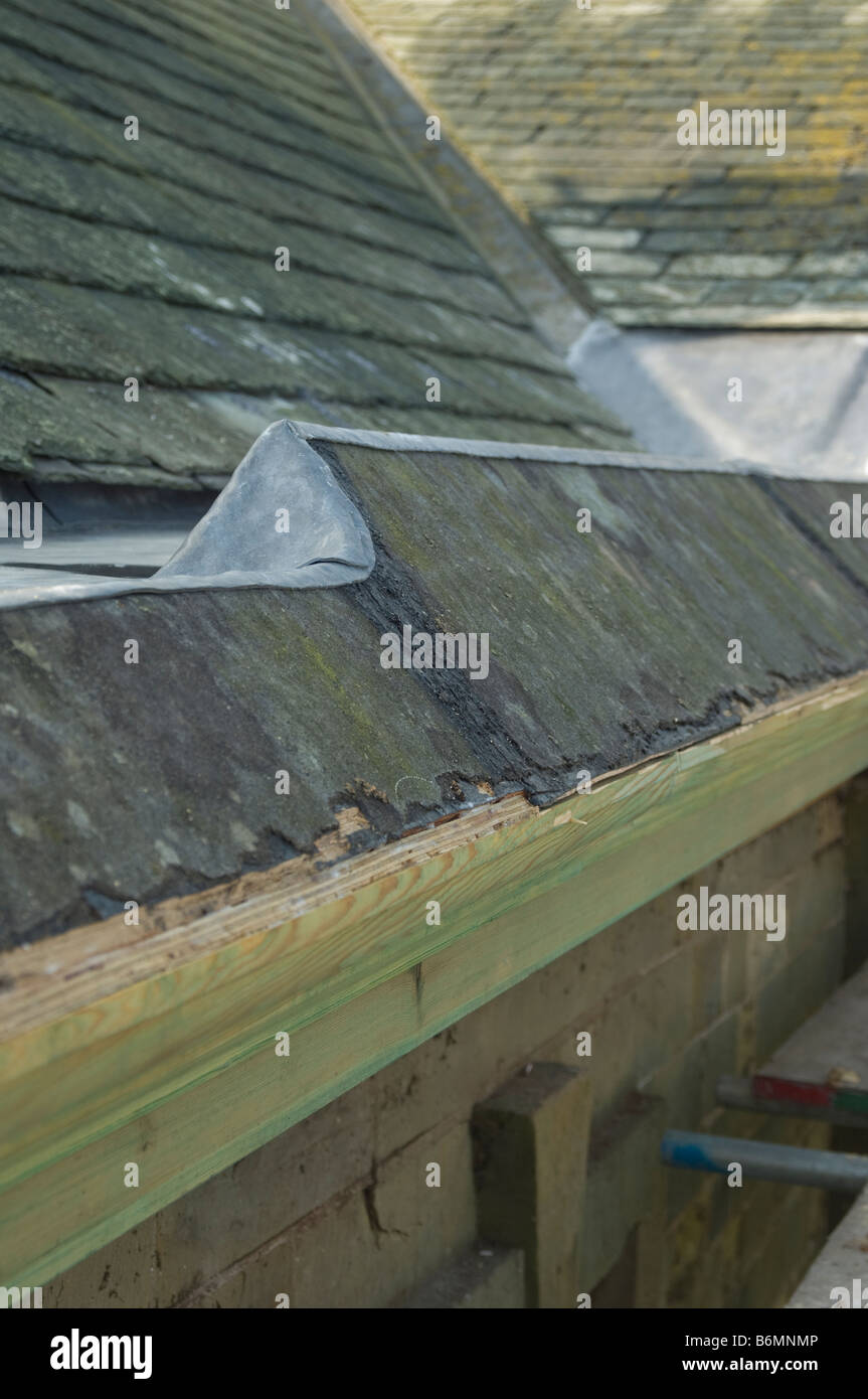 Edge construction of a lead valley on a traditional roof Stock Photo ...