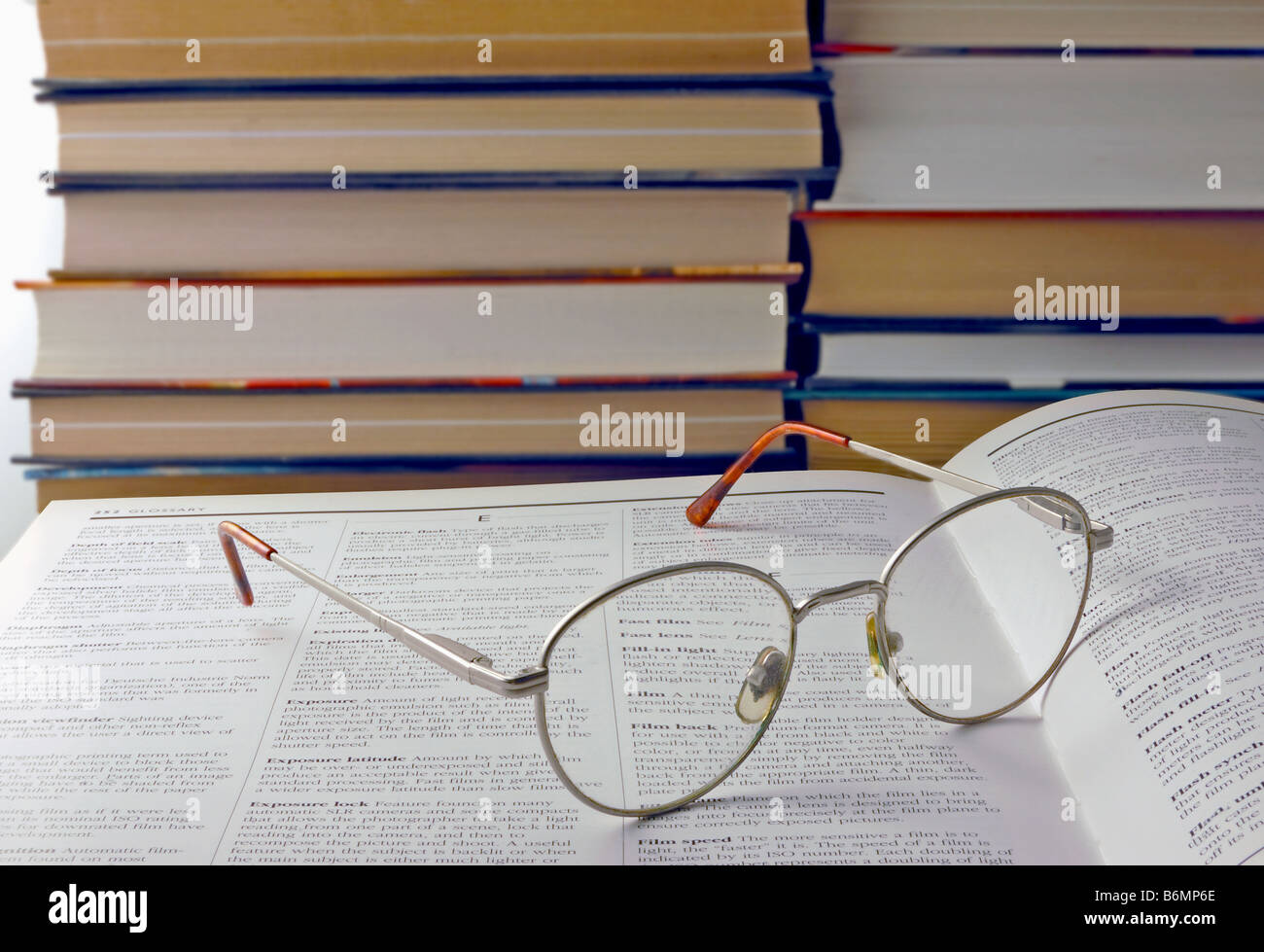 Reading of books in library Stock Photo - Alamy