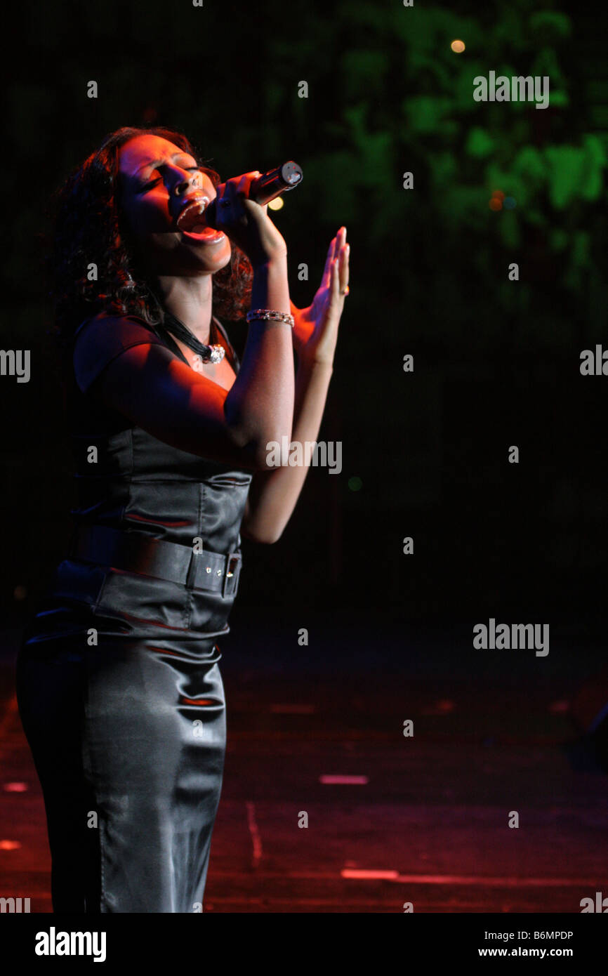 Alexandra Burke pop singer X Factor 2008 winner. Singing during Young ...