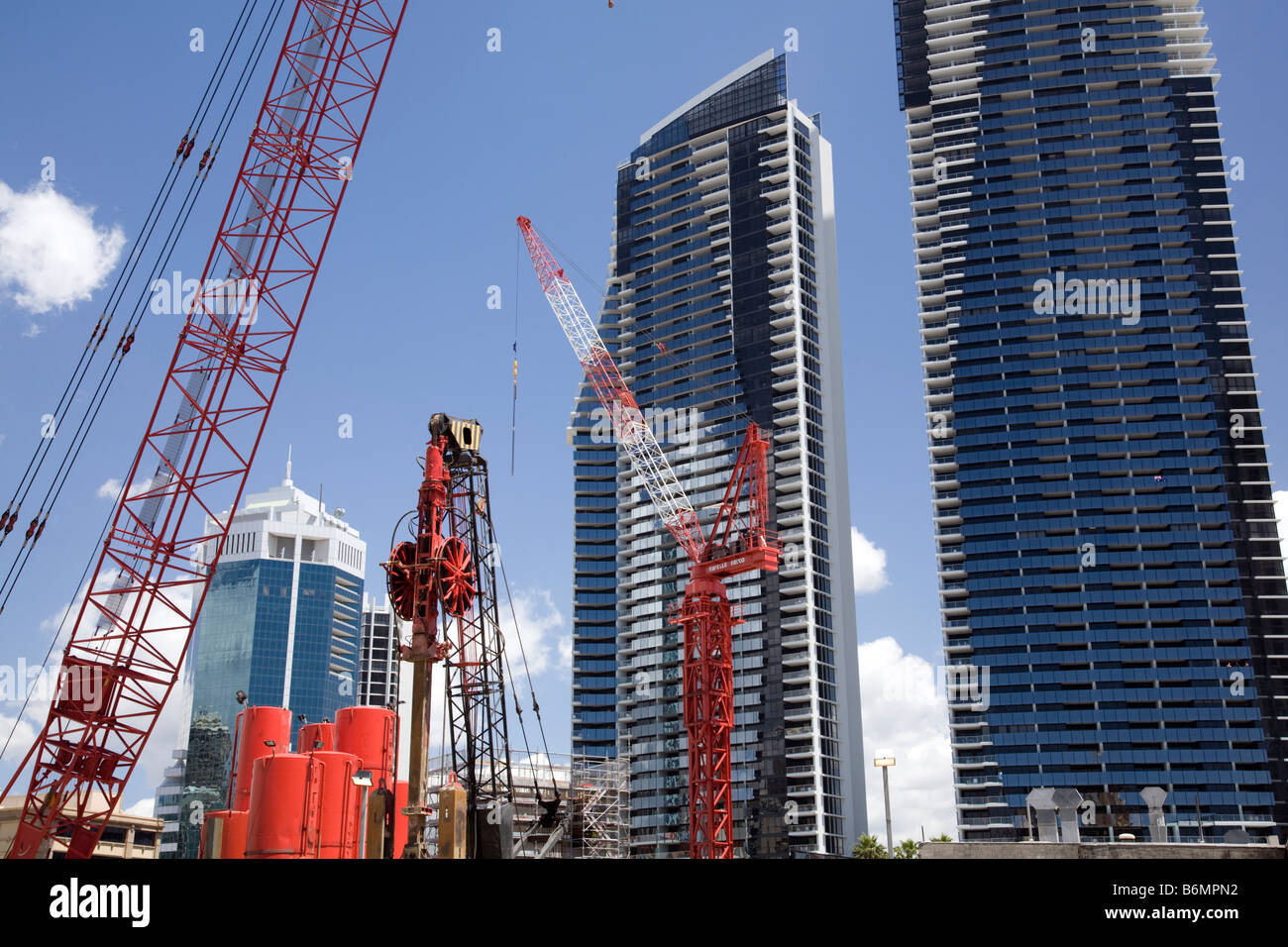 construction site activity taking place in front of skyscrapers on the ...