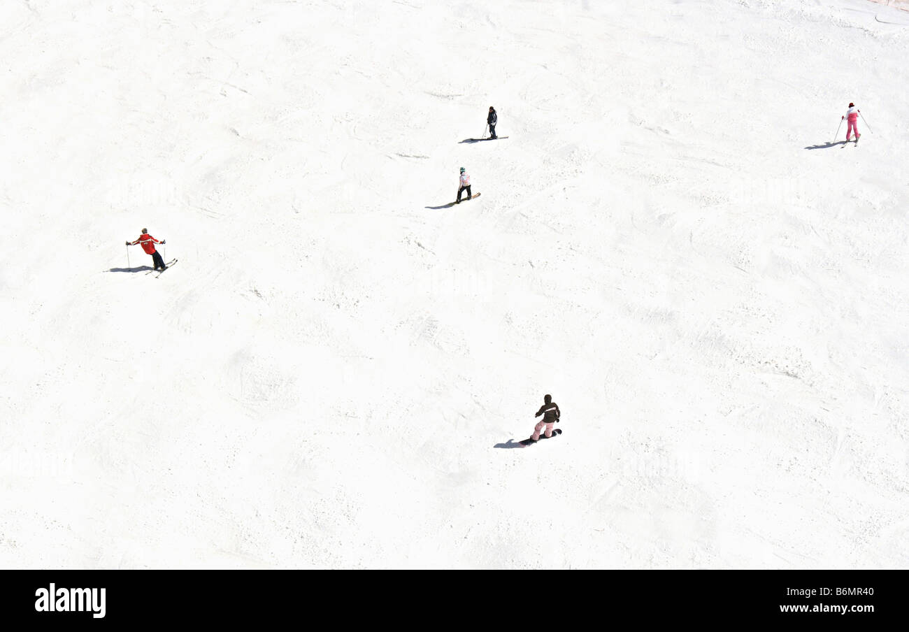 Aerial view on many skiers in action Stock Photo - Alamy
