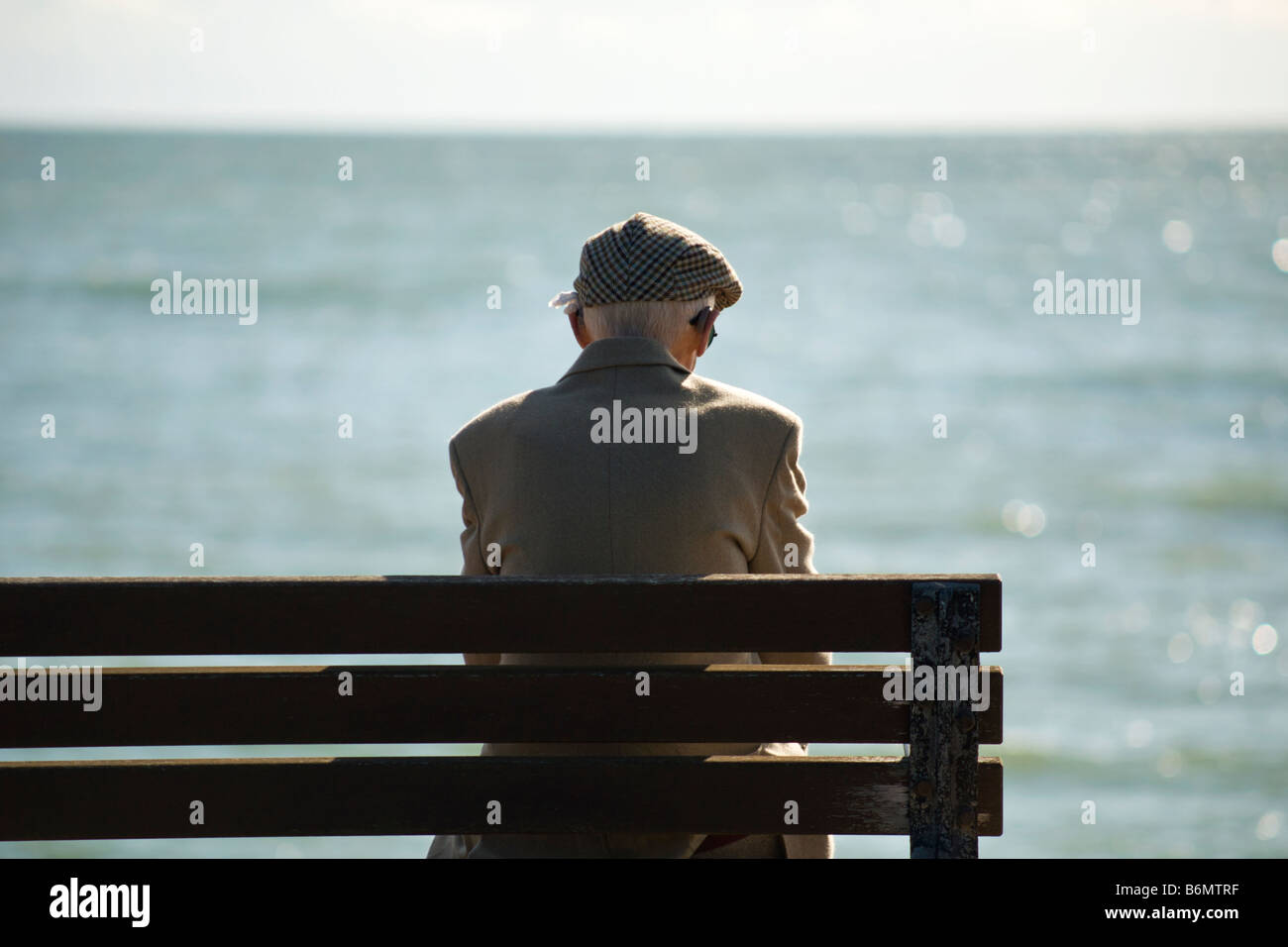 Old man looking out to see remembering and reminiscing Stock Photo - Alamy