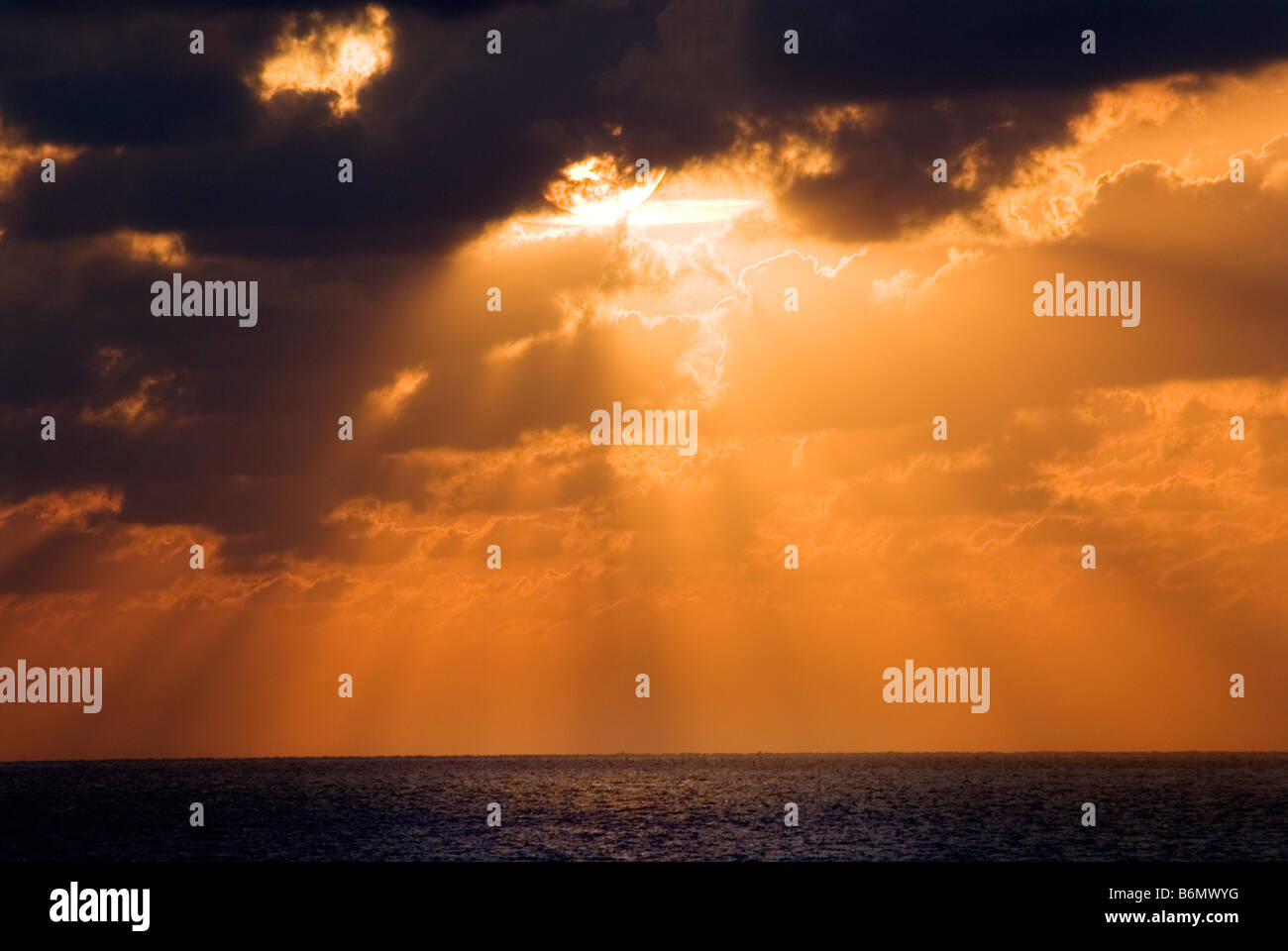 Sun breaking through clouds hi-res stock photography and images - Alamy