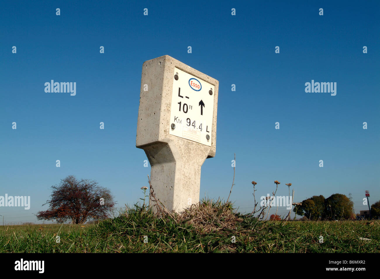 Oil pipeline marker Stock Photo - Alamy