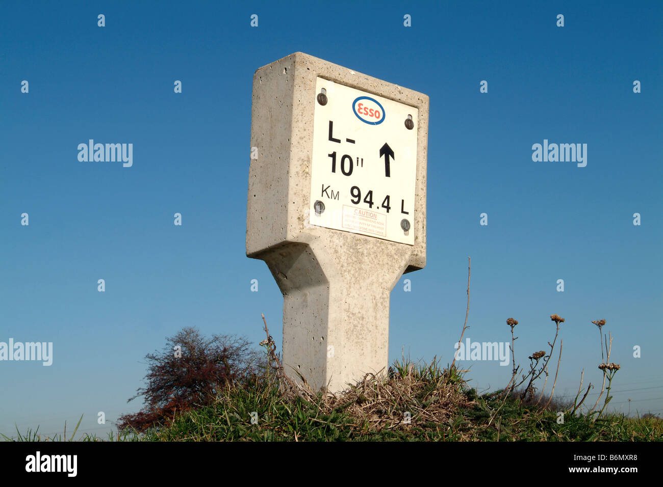 Oil pipeline marker Stock Photo - Alamy