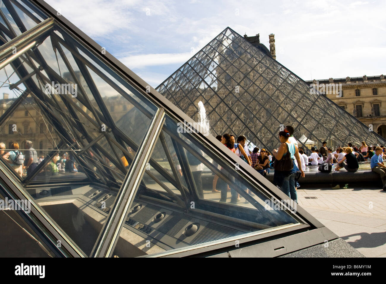 A detail shot of the glass pyramids at the Musee du Louvre in Paris ...