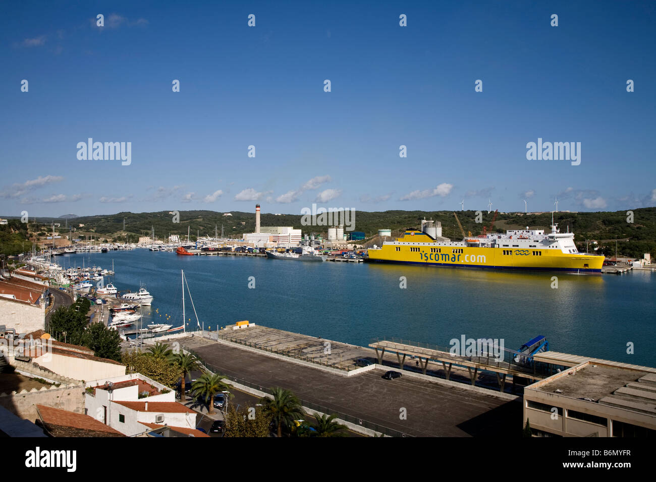 Mao port in Menorca, Spain with an Iscomar ferry loading in the estuary ...