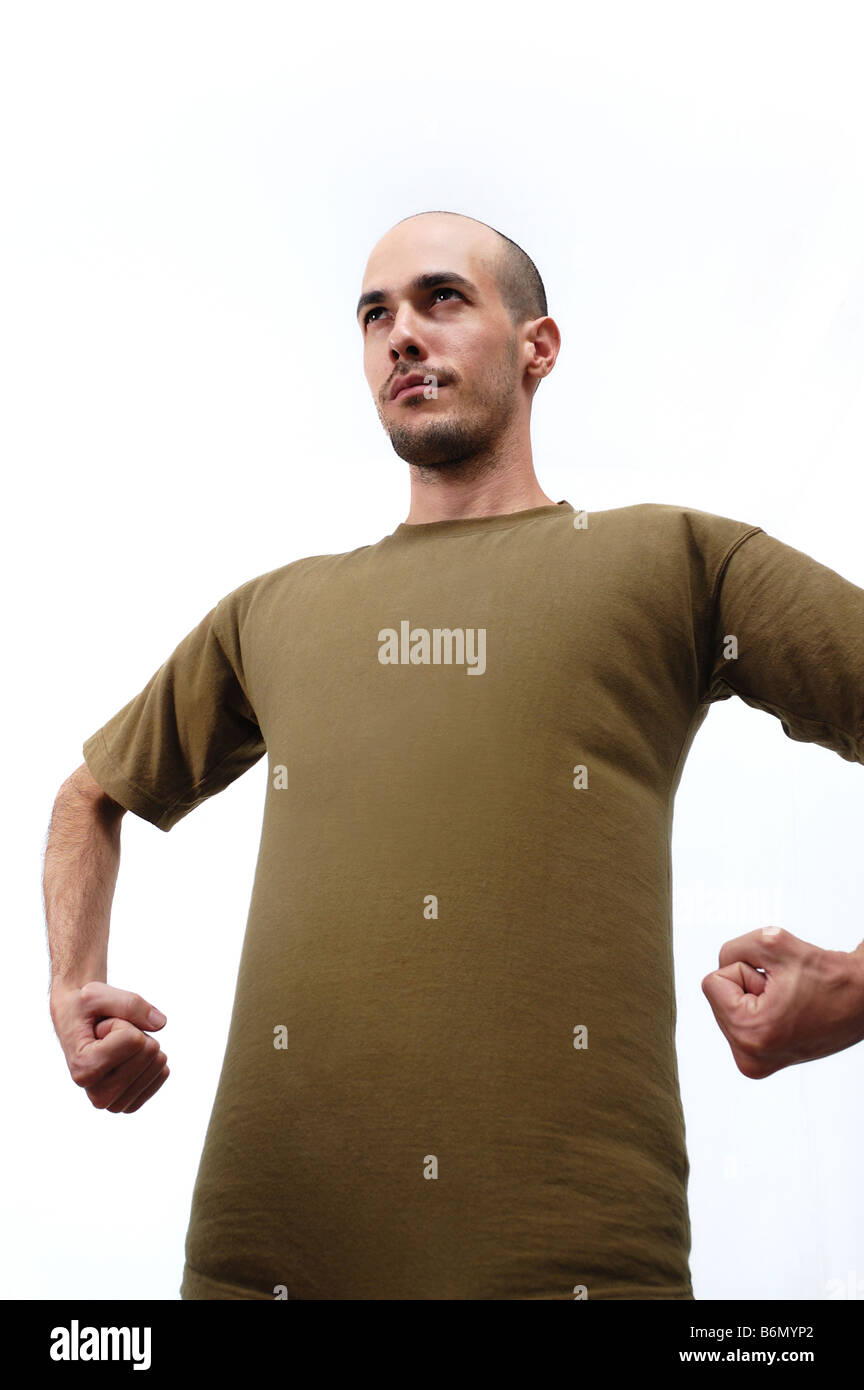 Portrait of a young man looking strong - isolated Stock Photo - Alamy