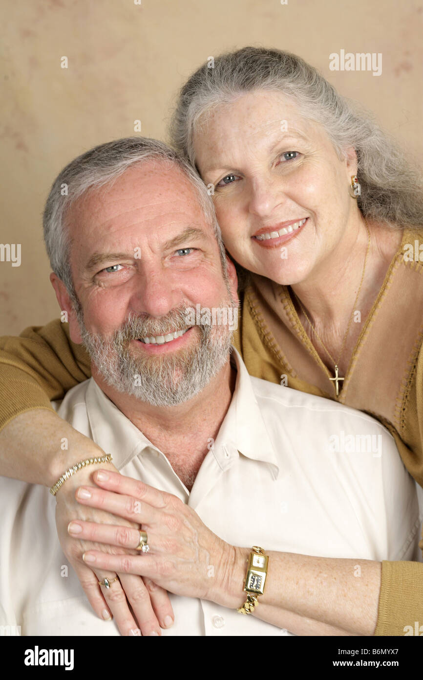 A beautiful happy middle aged couple in love Focus on her Stock Photo ...