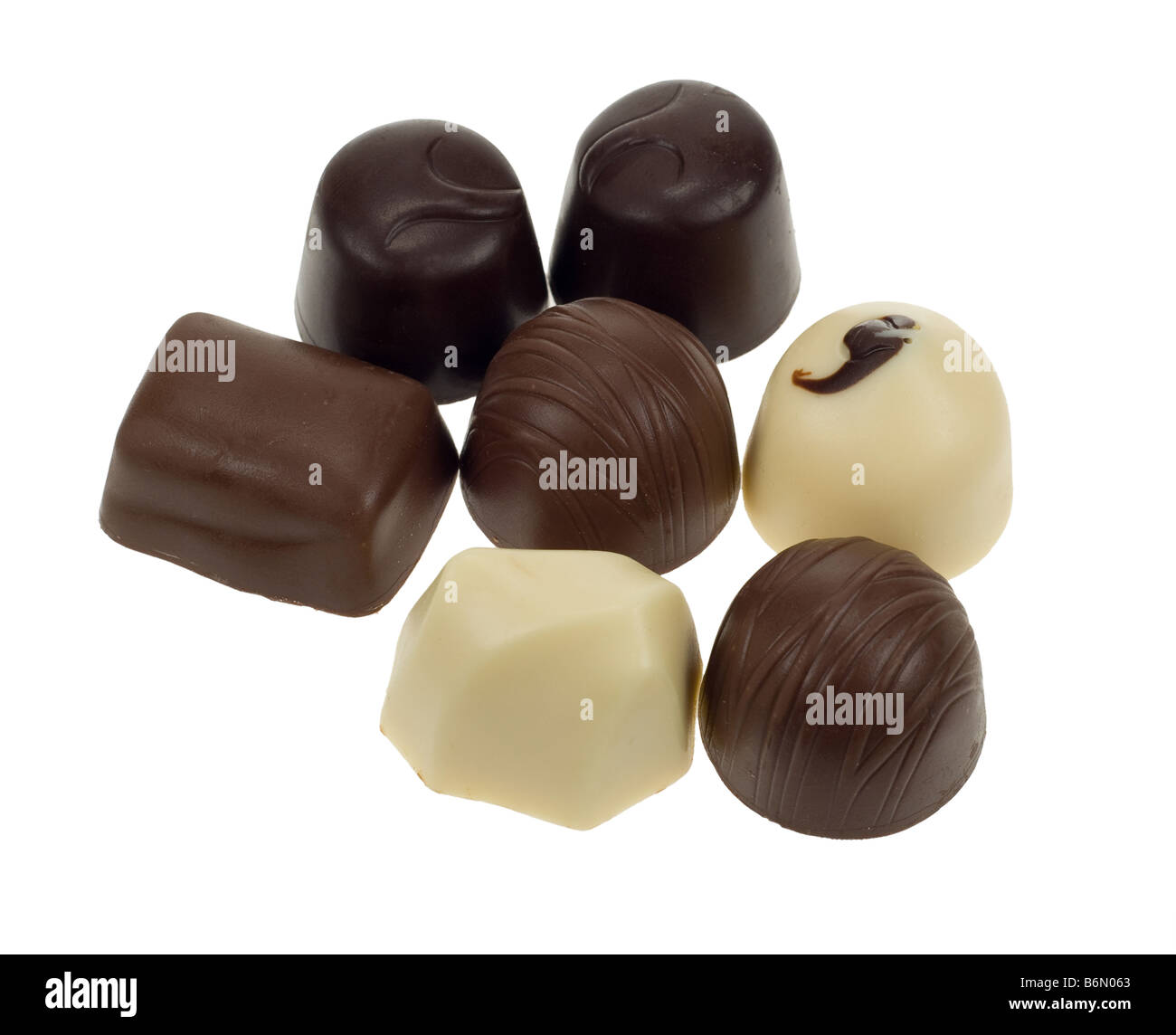 lots of belgian pralines isolated on a white background Stock Photo - Alamy