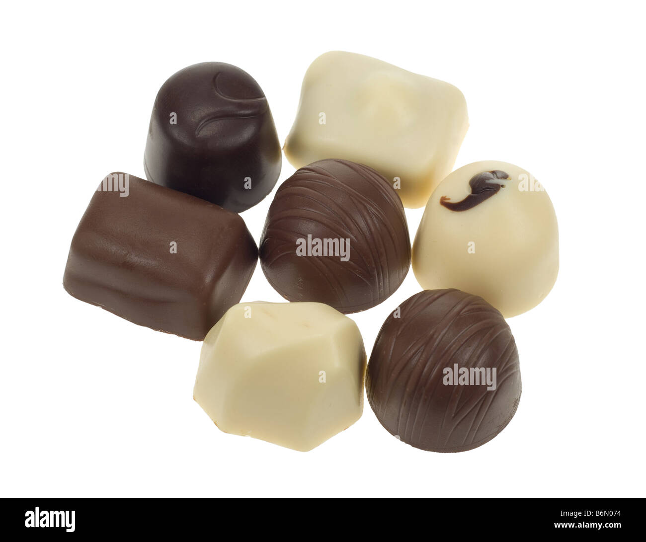 lots of belgian pralines isolated on a white background Stock Photo - Alamy