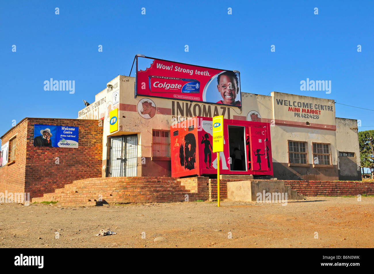 Township store and community telephone booth in one of the township ...