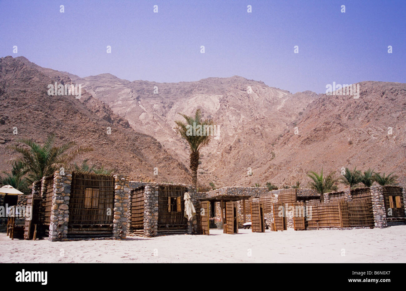 Holiday resort nestling at the base of the Musandam Mountain range ...