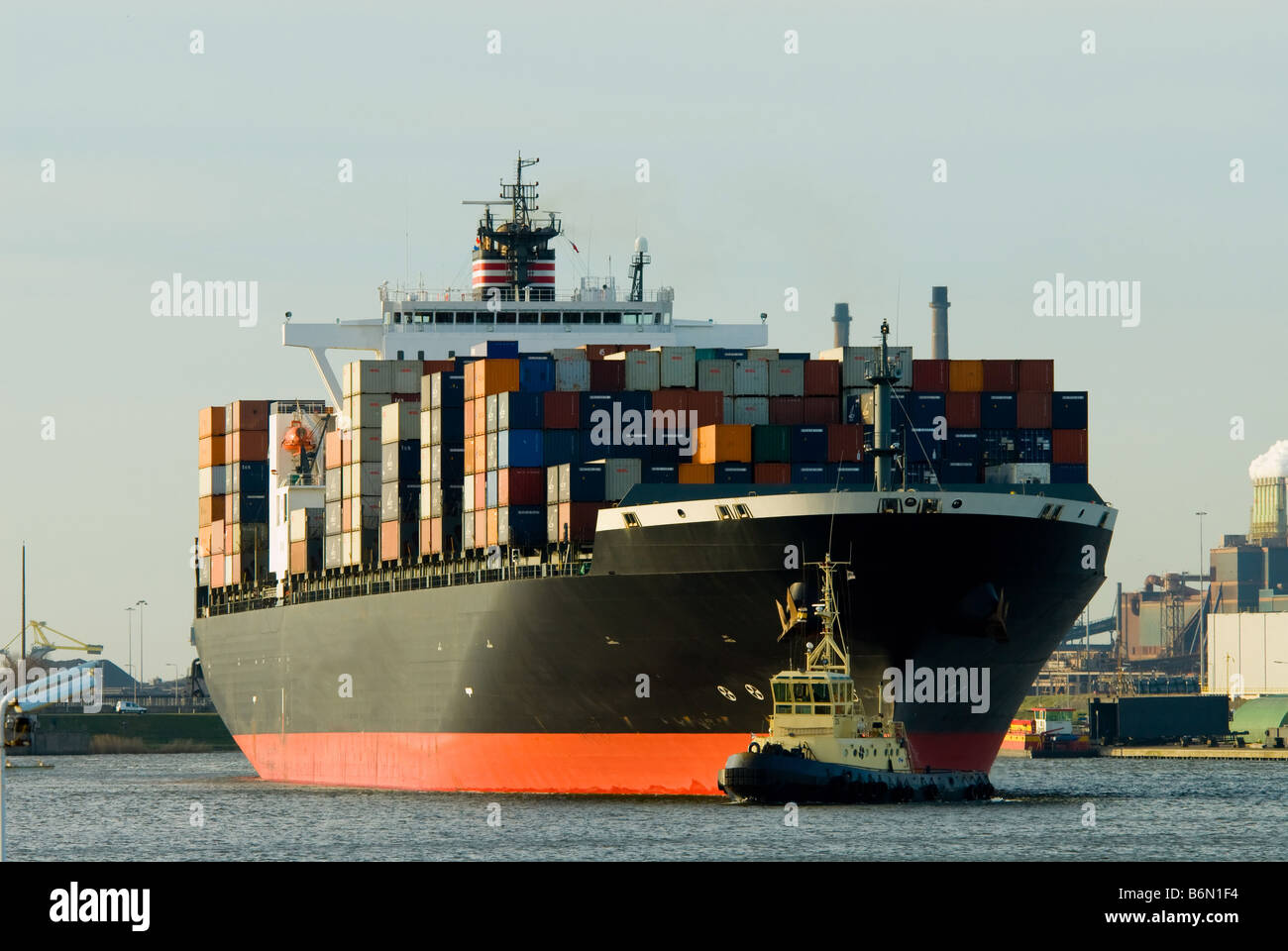 huge container ship in the harbor Stock Photo - Alamy