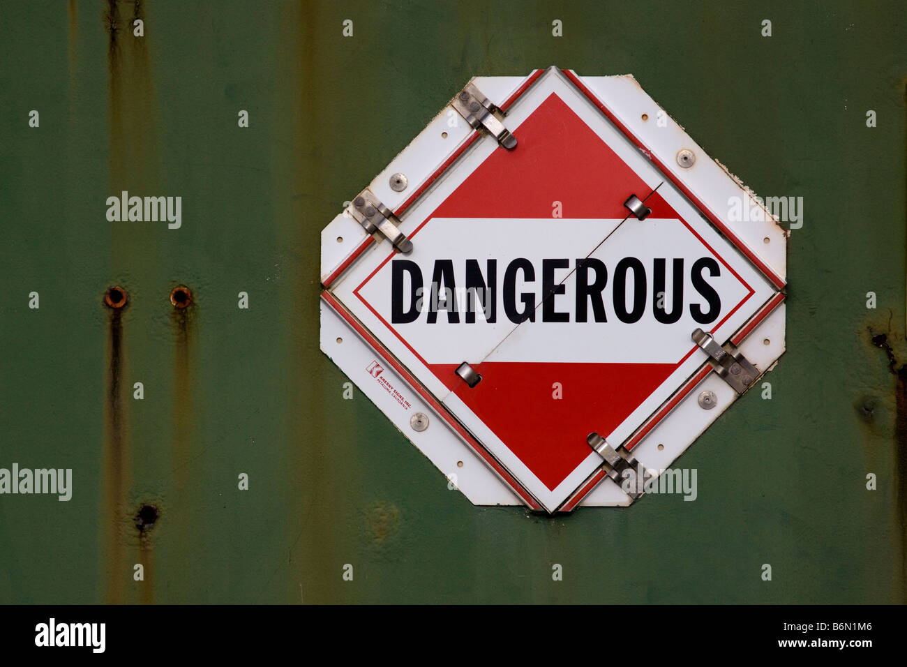Red sign warning dangerous Stock Photo - Alamy