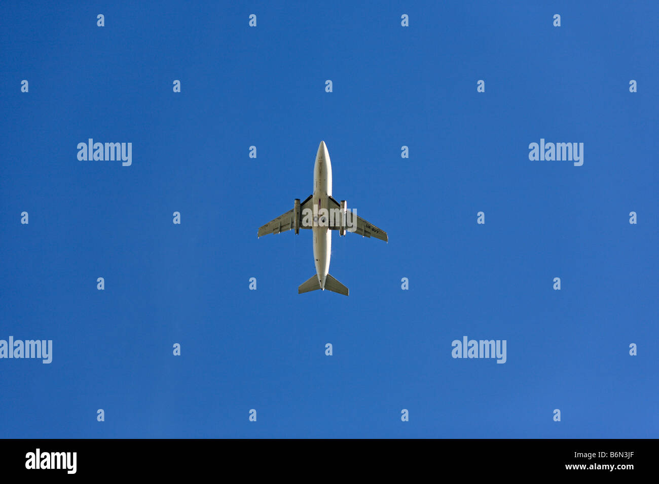 Airplane air plane jet blue sky aviation travel Stock Photo - Alamy