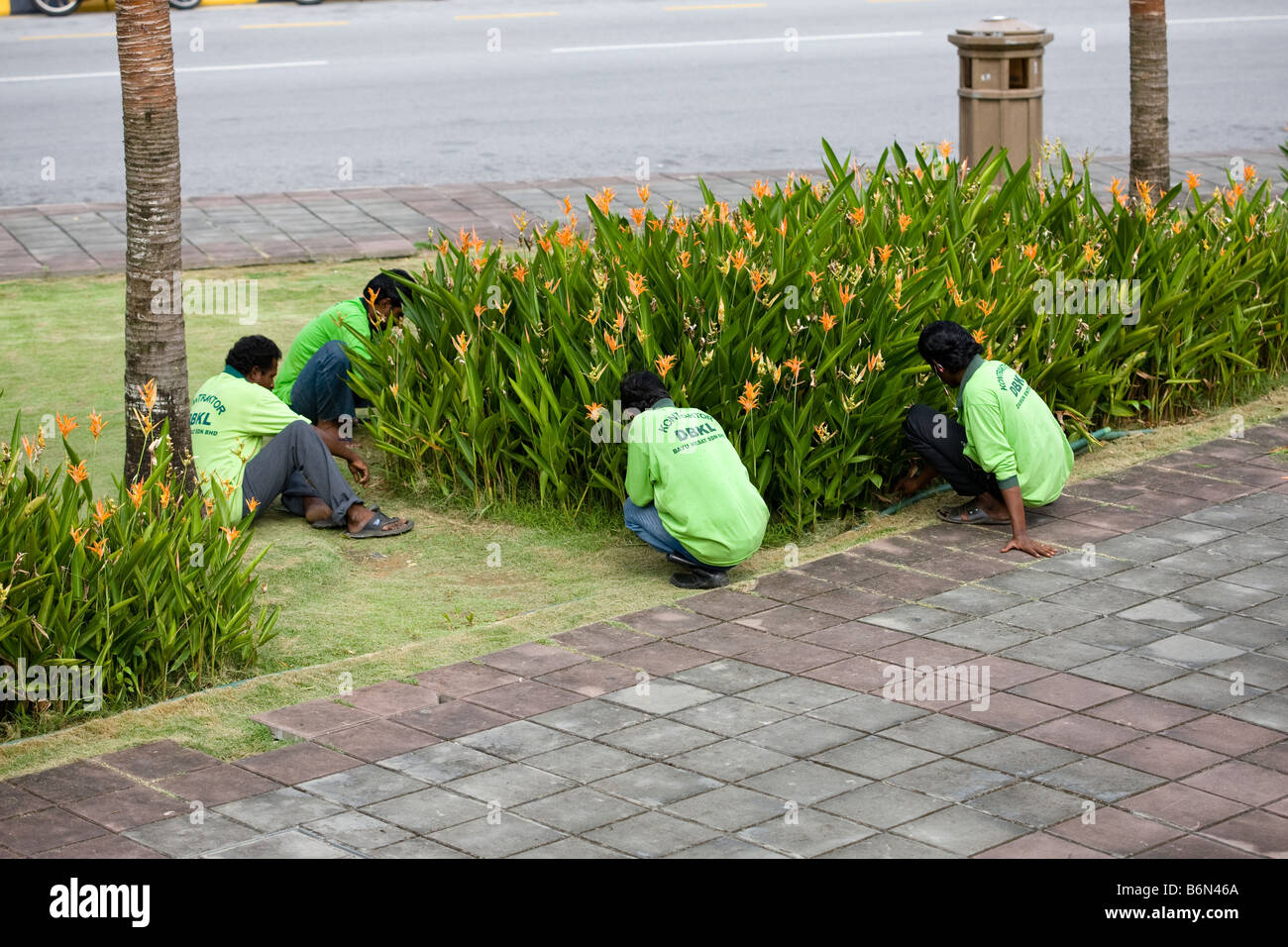 Community workers in Kuala Lumpur Stock Photo - Alamy