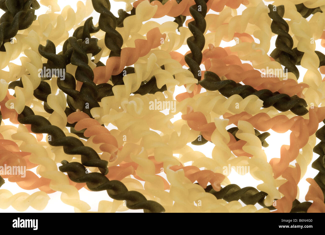 fusilli tricolore pasta isolated on a white background Stock Photo - Alamy