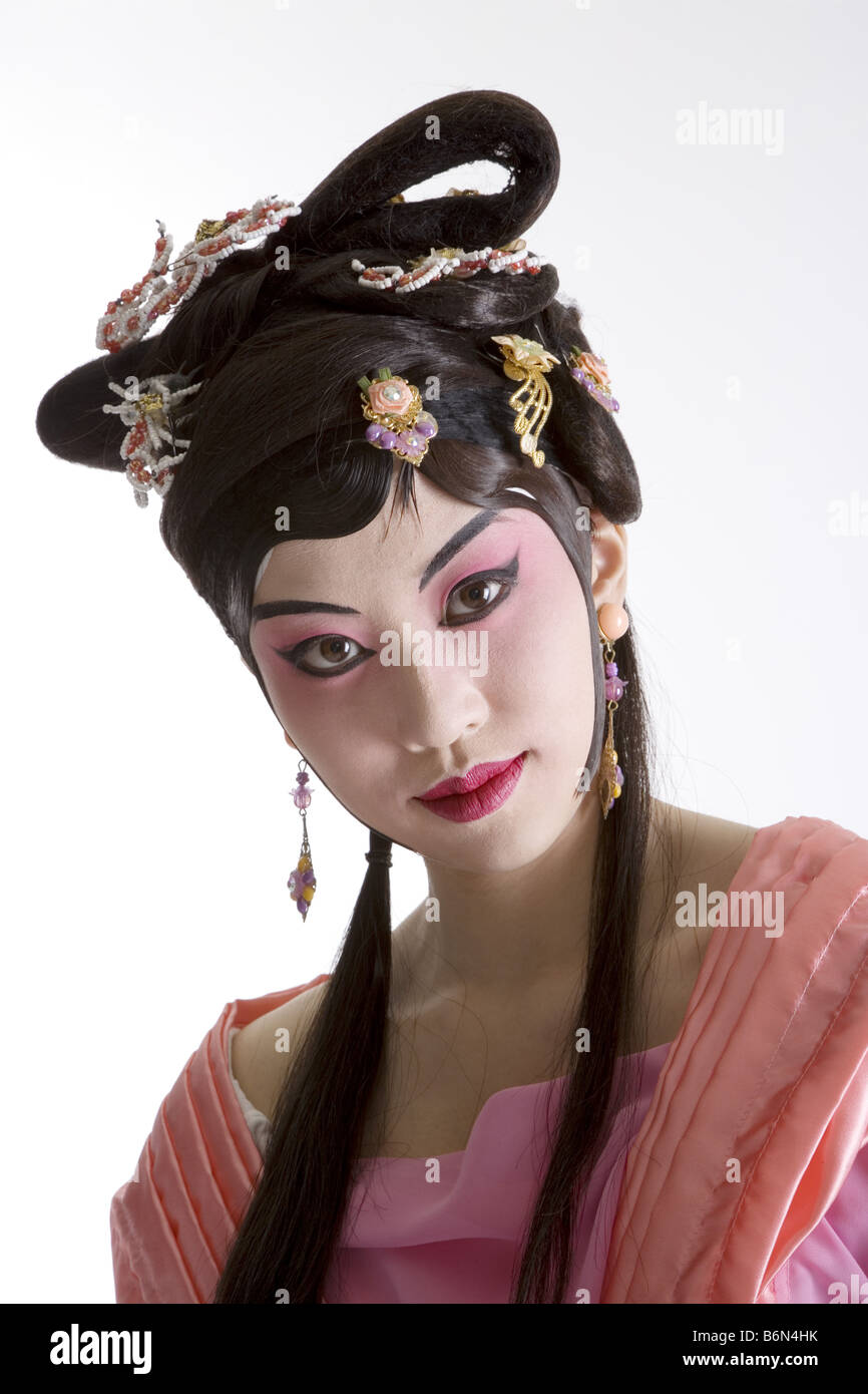 Portrait of Beijing opera performer in traditional dress and make up ...