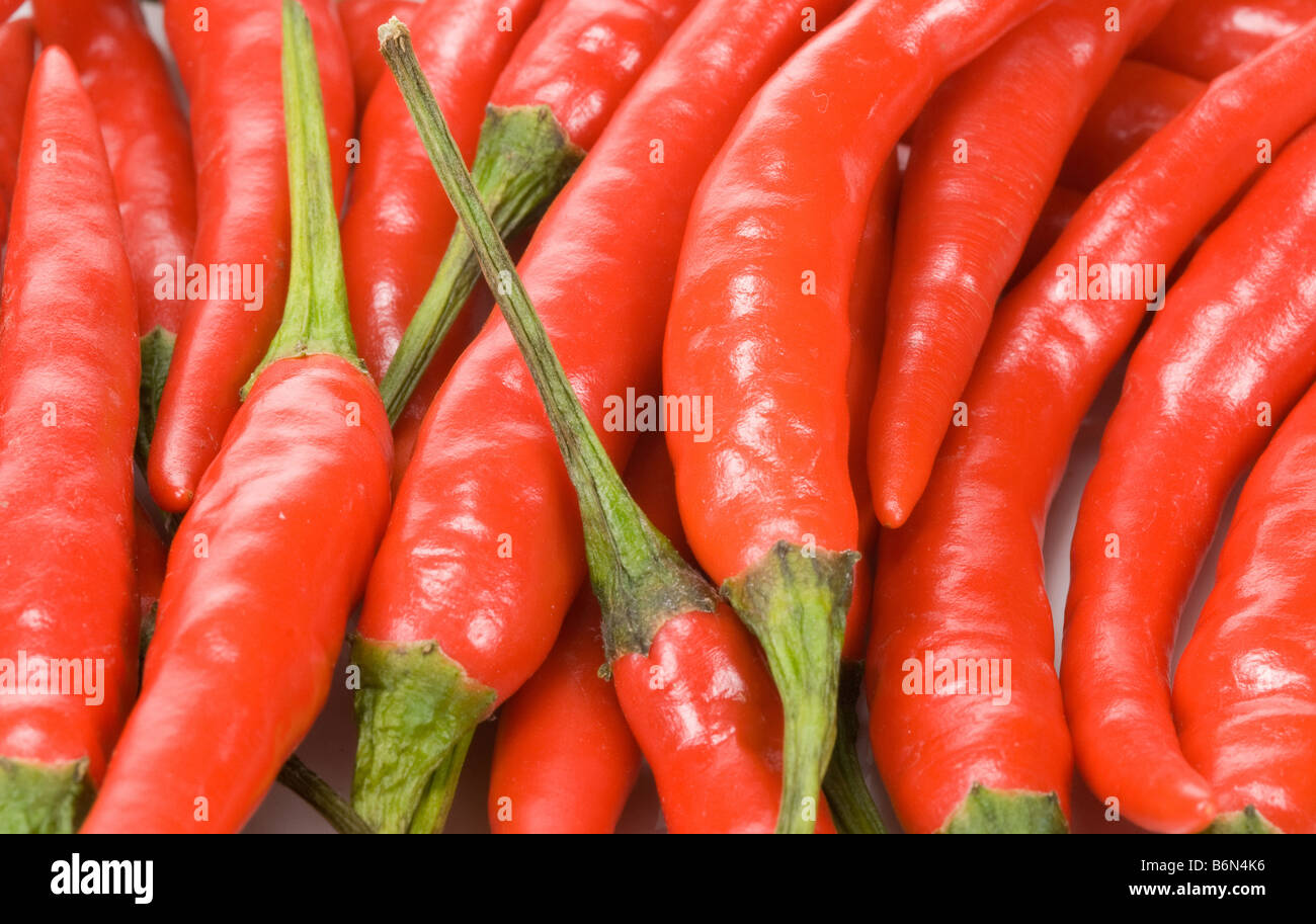 close up of fresh red chili peppers for backgrounds Stock Photo - Alamy