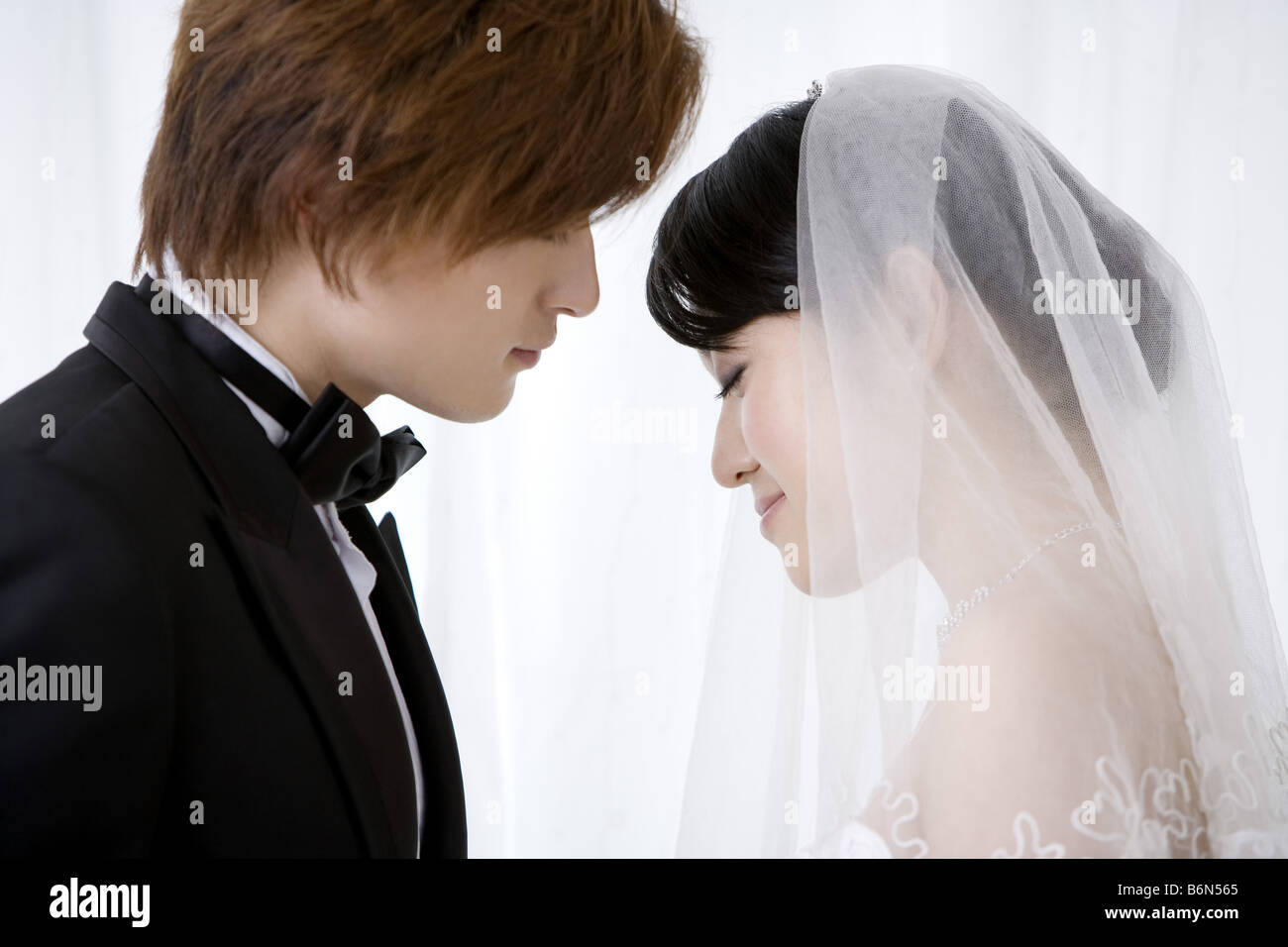 Young bride and groom portrait Stock Photo - Alamy