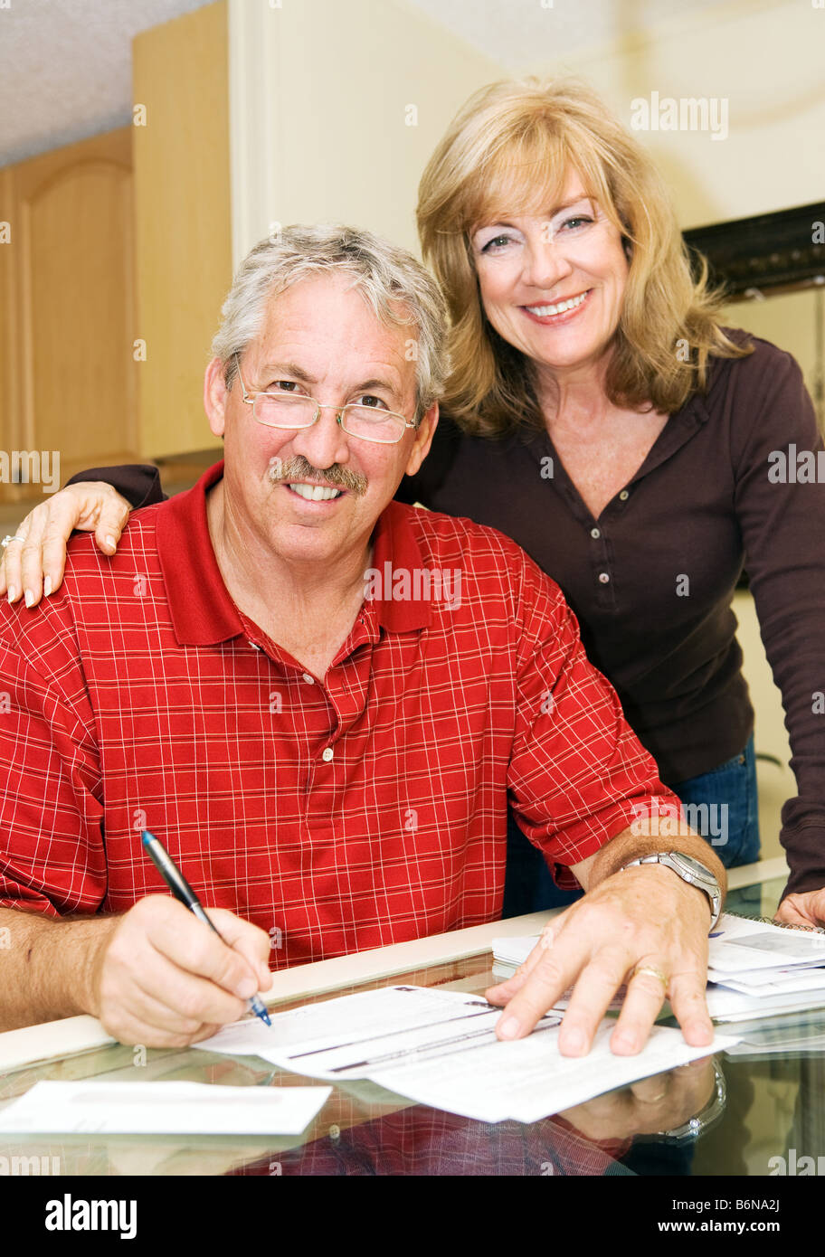 Couple paying bills going over hi-res stock photography and images - Alamy