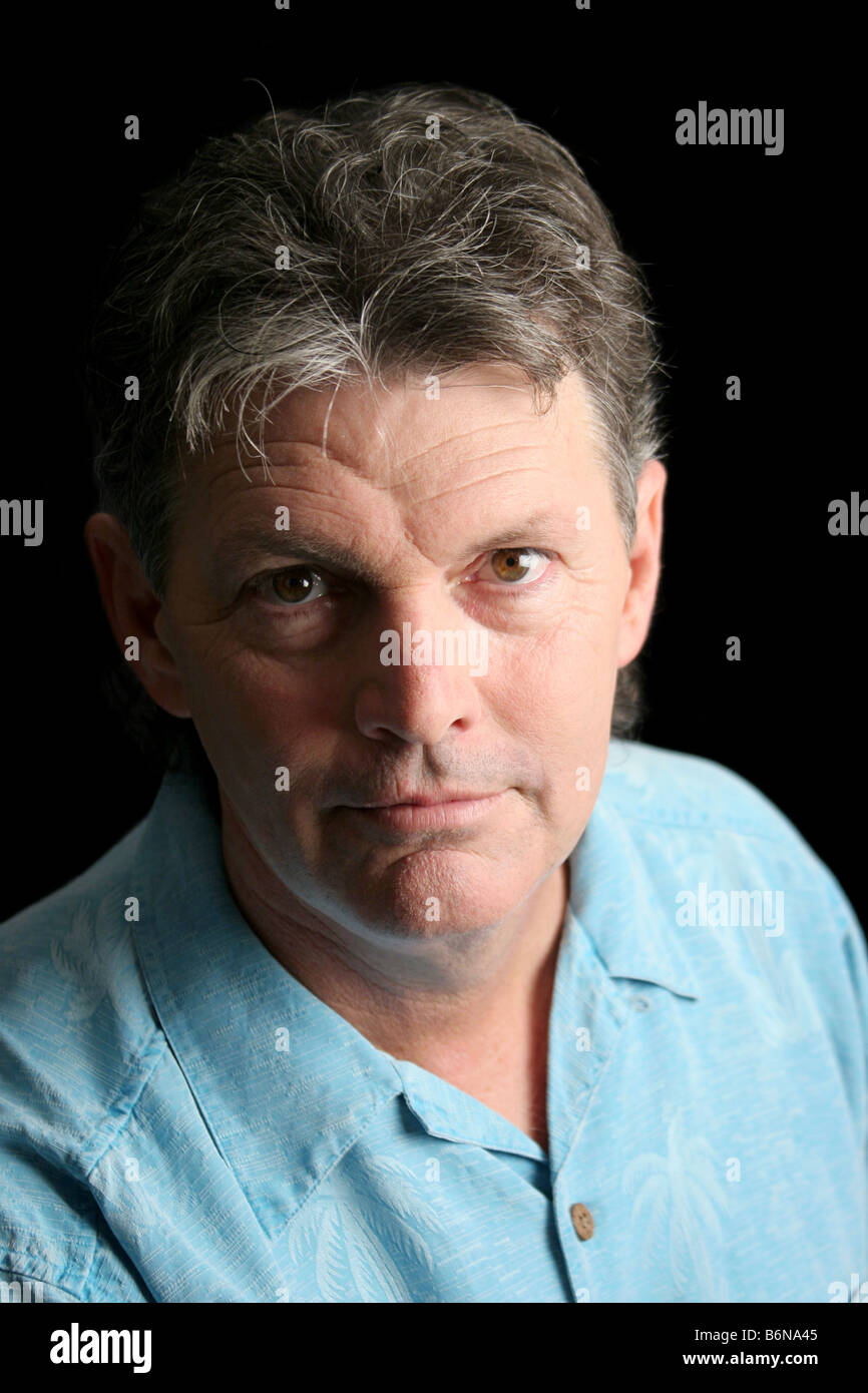 A middle aged man suffering from depression Dramatic lighting over ...