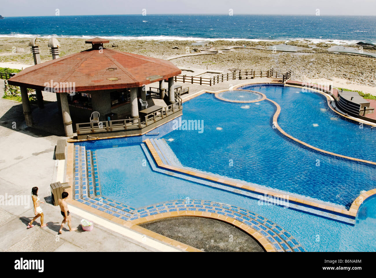 Taiwan, Couple Walking To The Pool At Green Island Jhaorih Saltwater ...