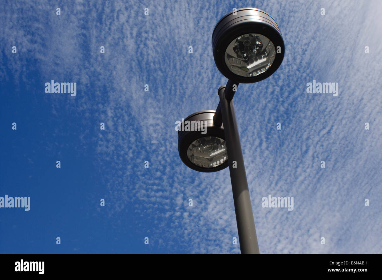 Street light with middle clouds Stock Photo - Alamy