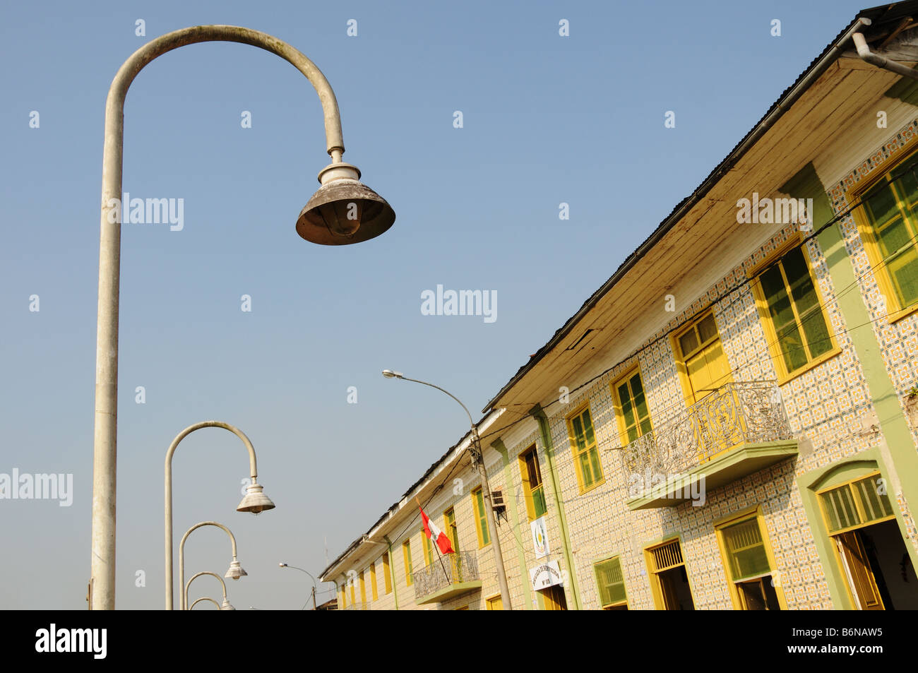 Tiled buildings from the rubber boom era line the streets of Iquitos ...