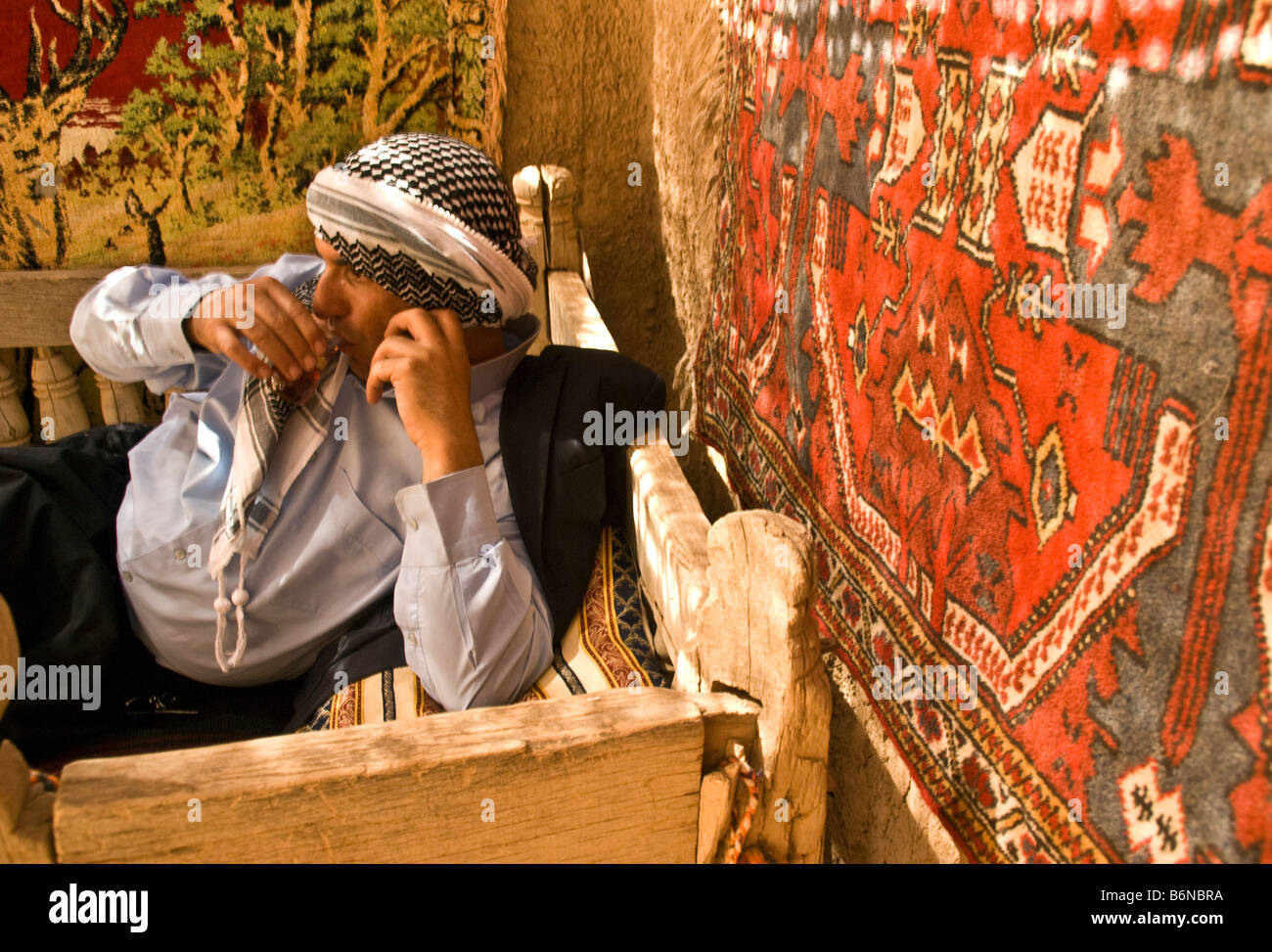 Harran Culture House with Kurdish Turk drinking tea Stock Photo - Alamy