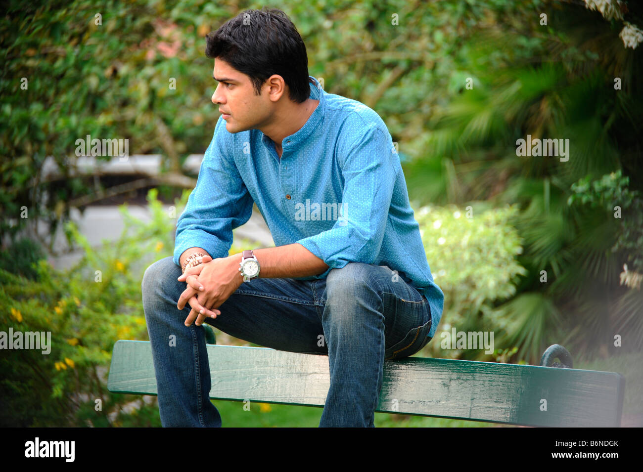 An indian boy thinking Stock Photo - Alamy