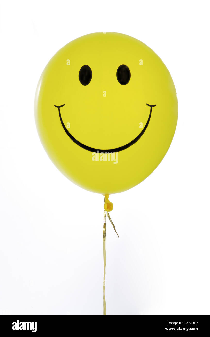 Balloon with smiley face against white background Stock Photo - Alamy