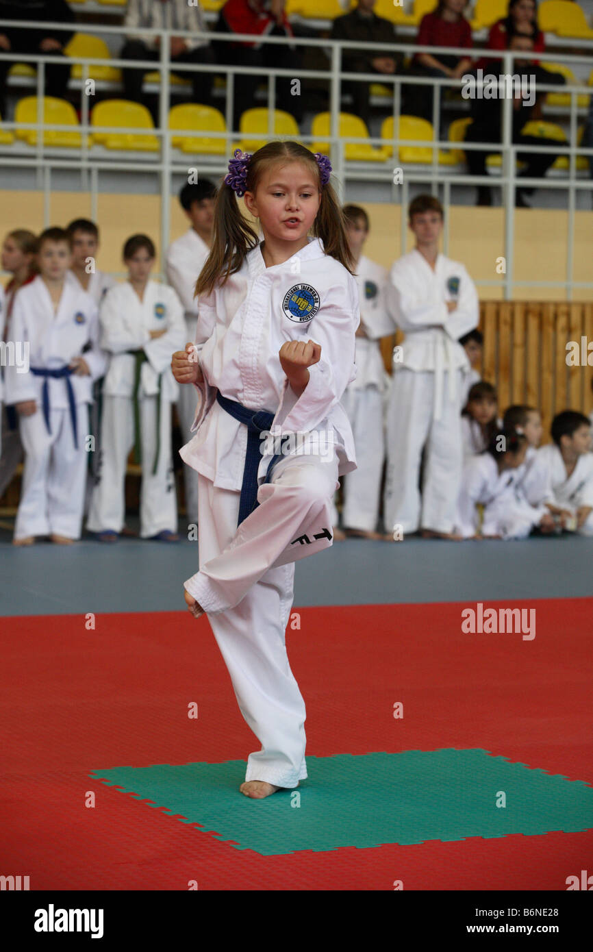 Girl performs karate demonstration on the sport arena Stock Photo - Alamy